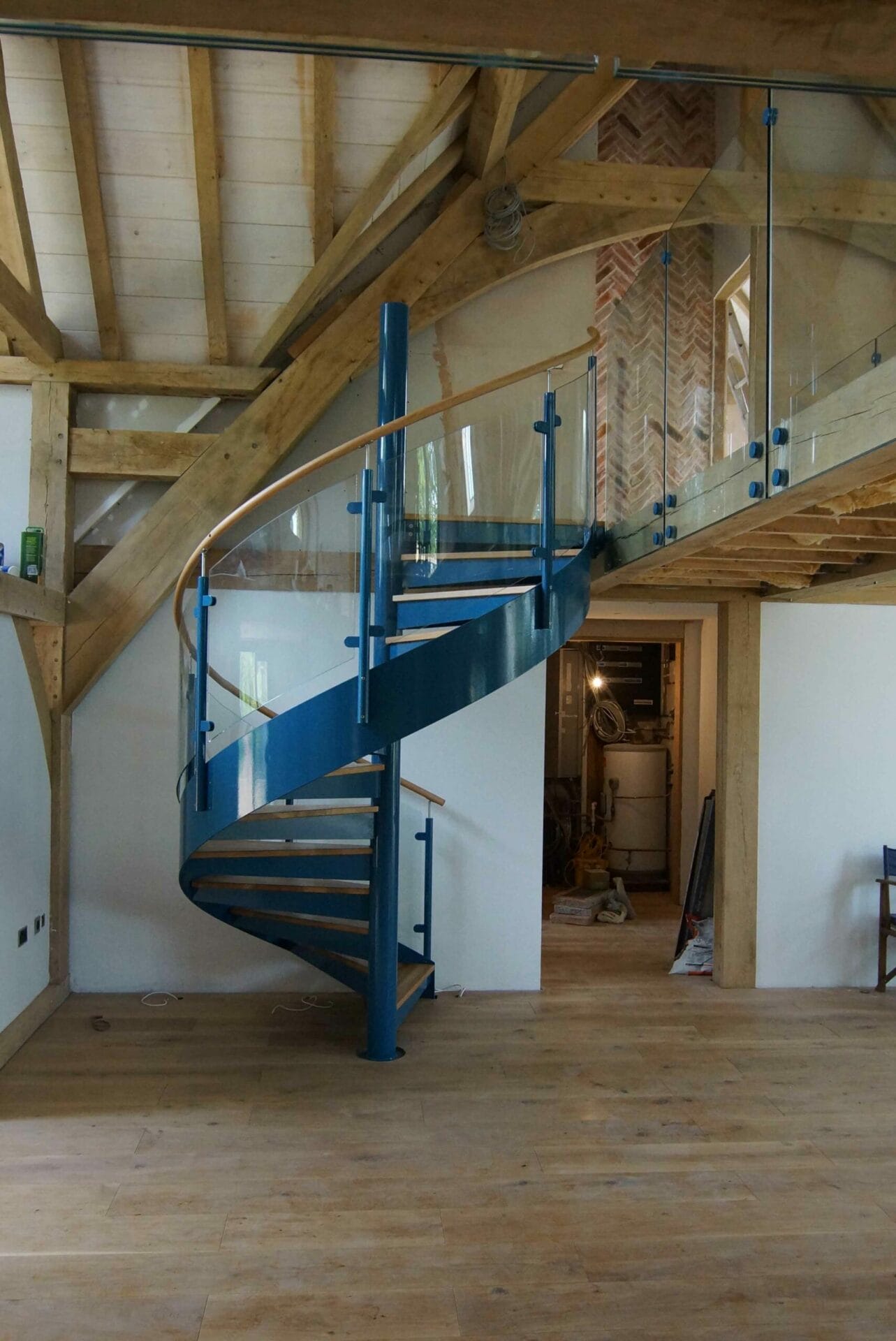 Blue Barn Spiral Staircase with Oak Treads – Paradigm Stairs